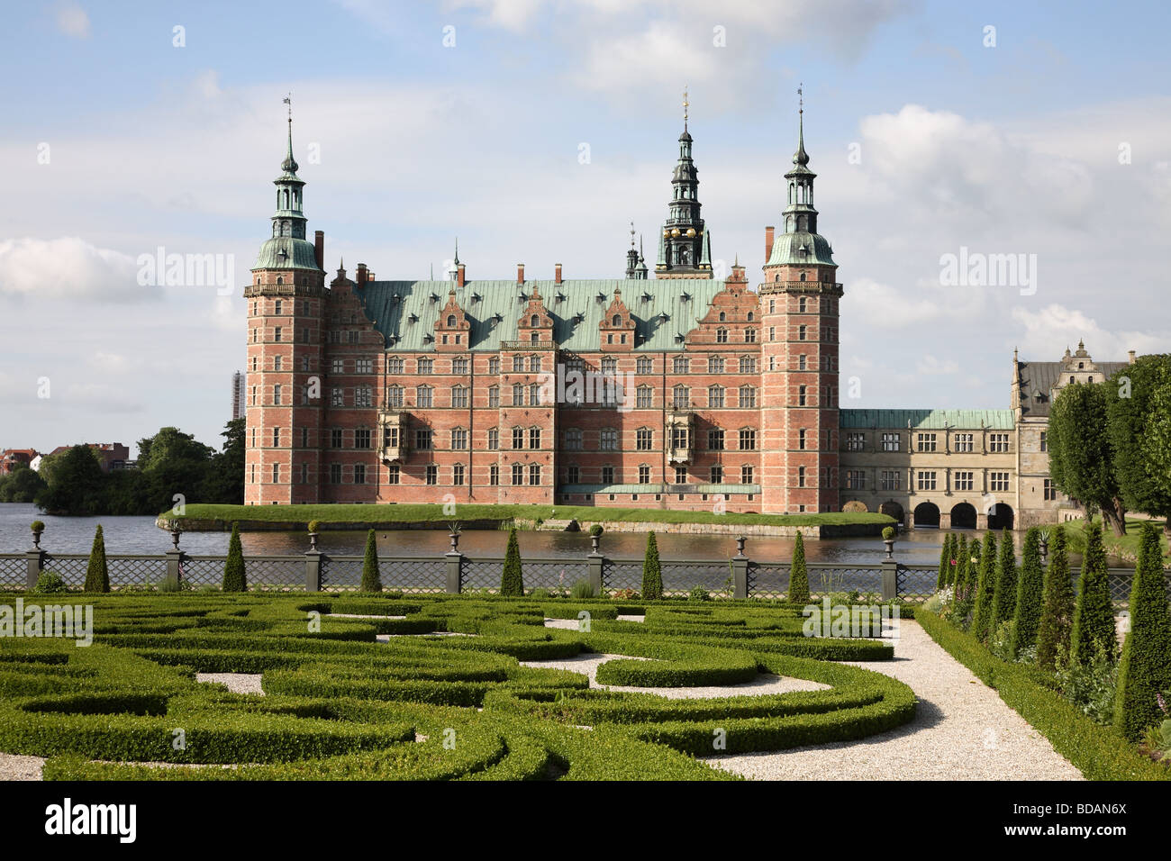 The Frederiksborg Castle in Dutch Renaissance style, in front the ...