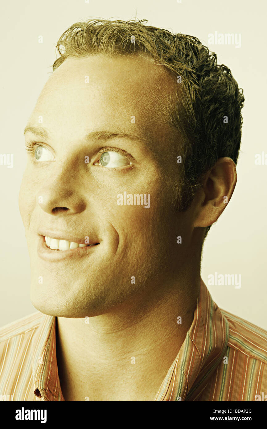 Close-up of a mid adult man smiling Stock Photo - Alamy