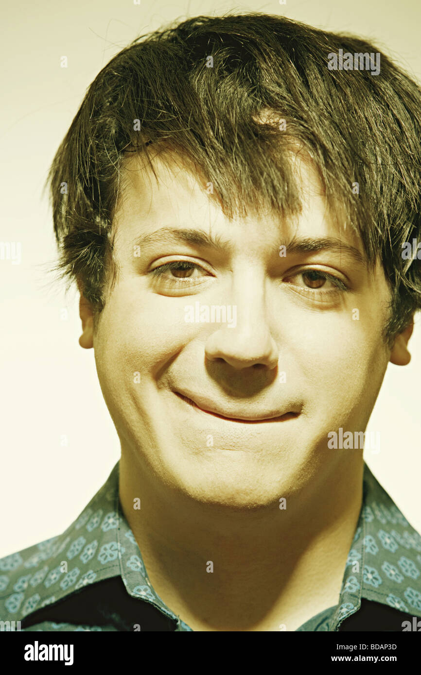 Portrait of a young man making a face Stock Photo - Alamy