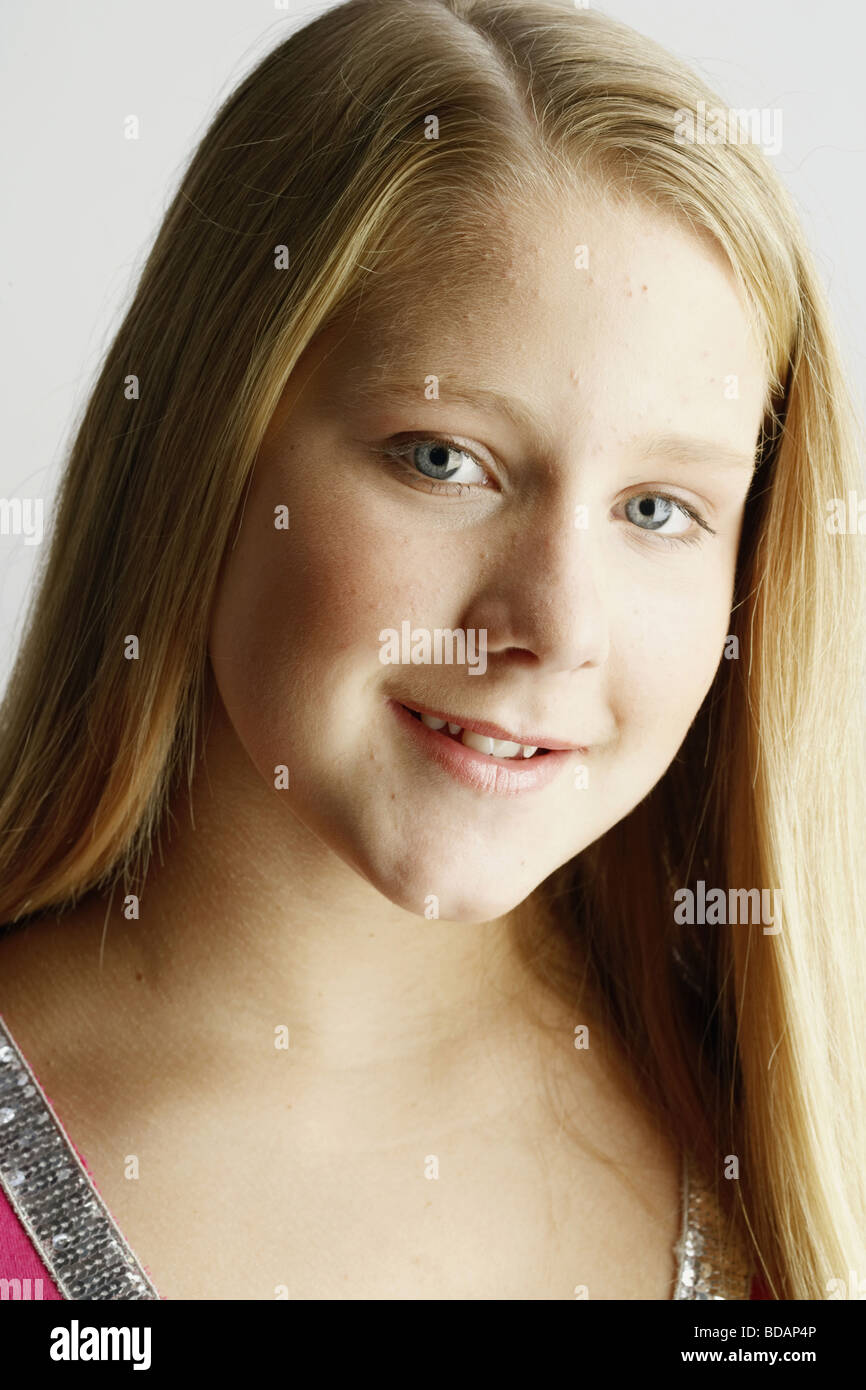 Portrait of a teenage girl smiling Stock Photo - Alamy Portrait of a teenage girl smiling Stock Photo - Alamy