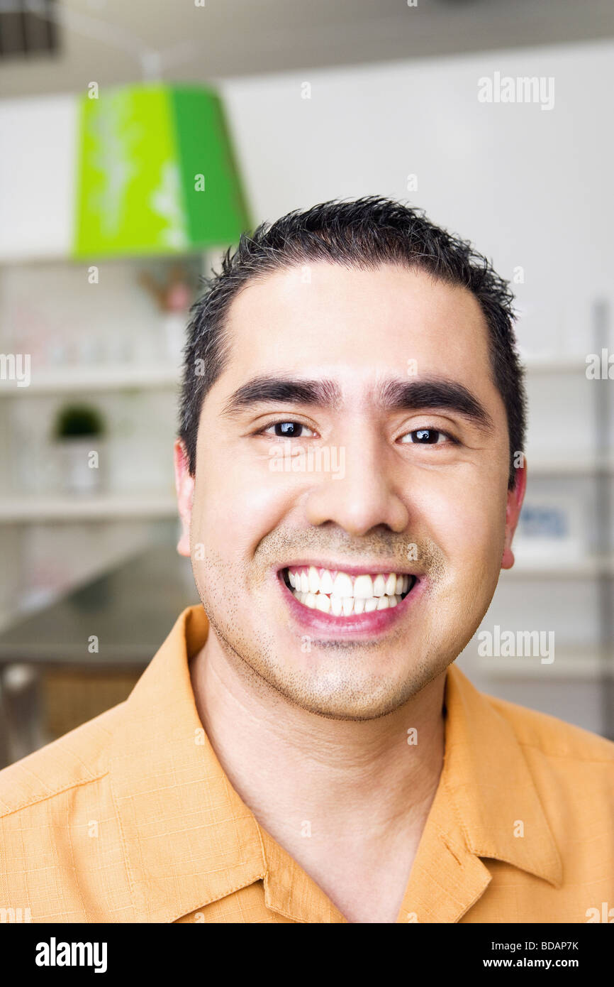Portrait of a mature man clenching his teeth Stock Photo - Alamy