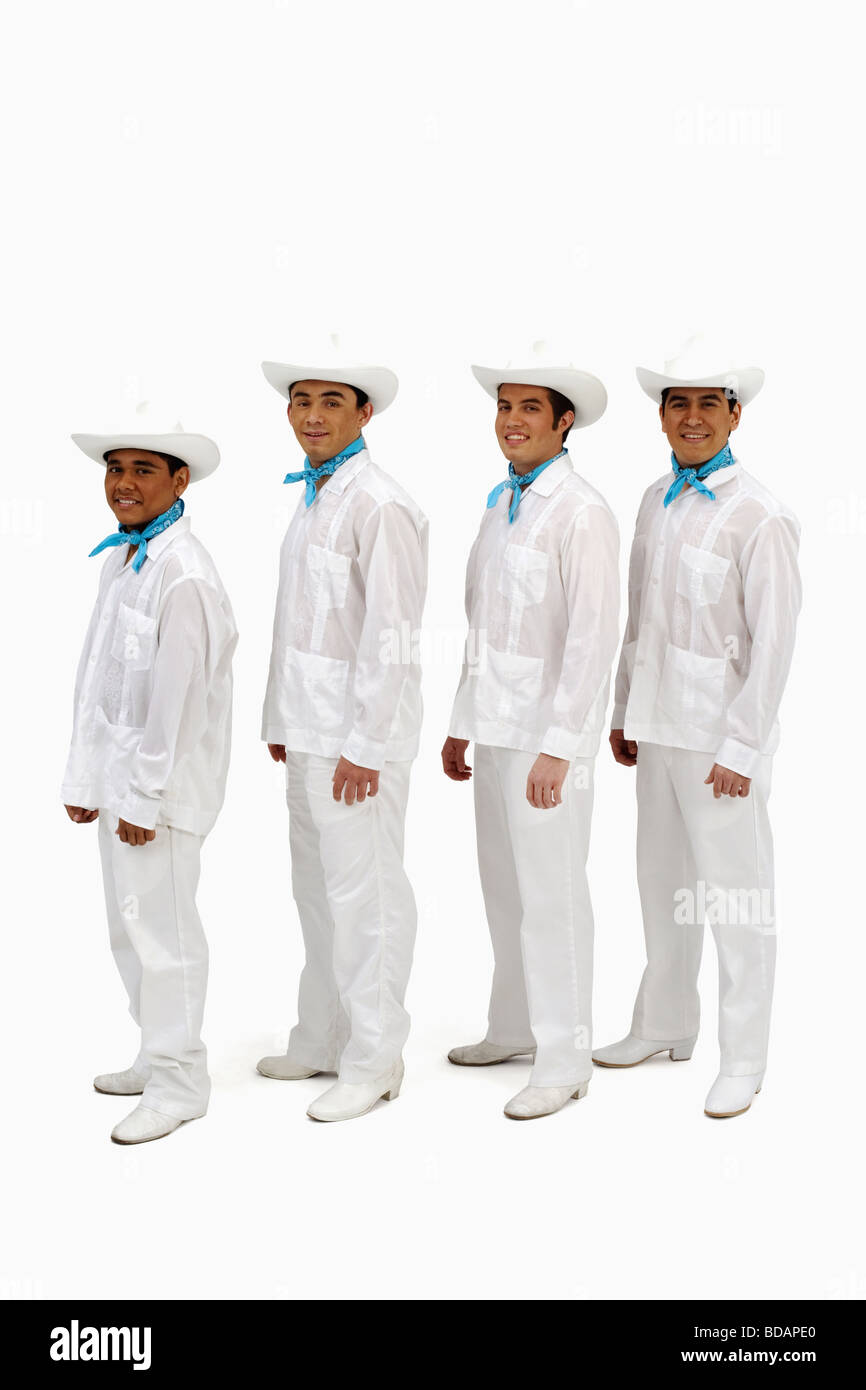 Portrait of four young men in typical Mexican costume Stock Photo - Alamy