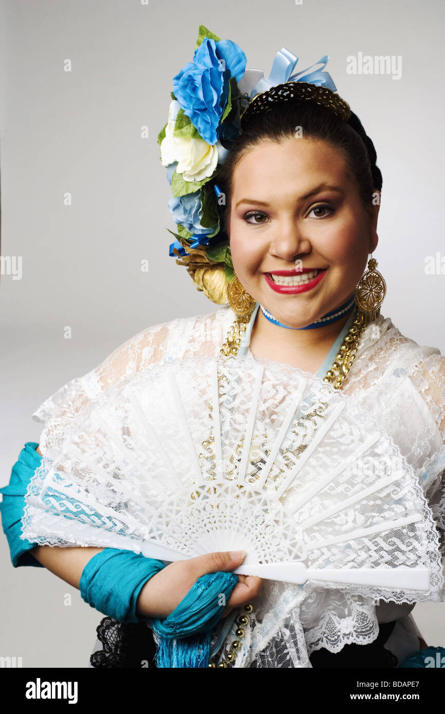 Portrait of a lady with a fan hi-res stock photography and images - Alamy