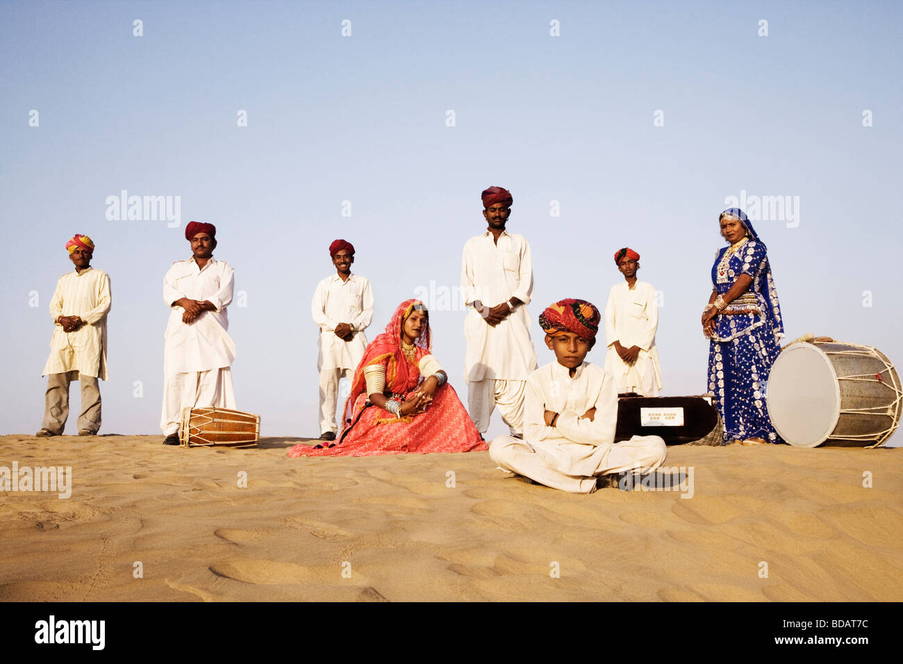 Folk artists performing in a desert, Thar Desert, Jaisalmer, Rajasthan ...