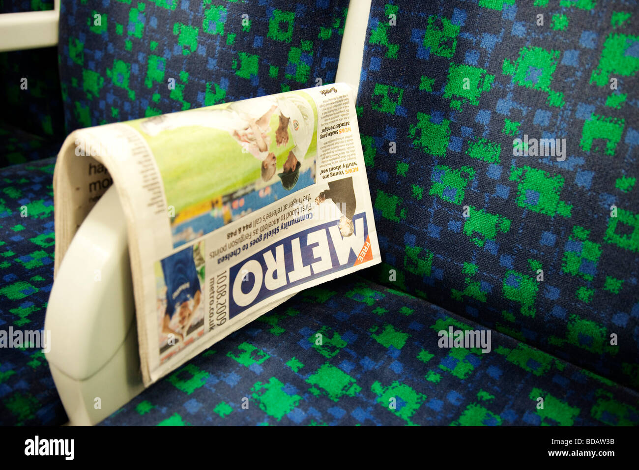 Metro newspaper on a London Underground Stock Photo - Alamy