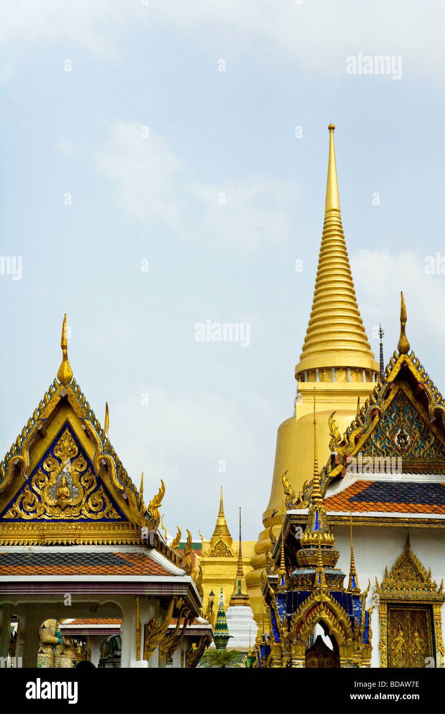 Traditional structures decorated in gold at the Grand Palace in Bangkok ...