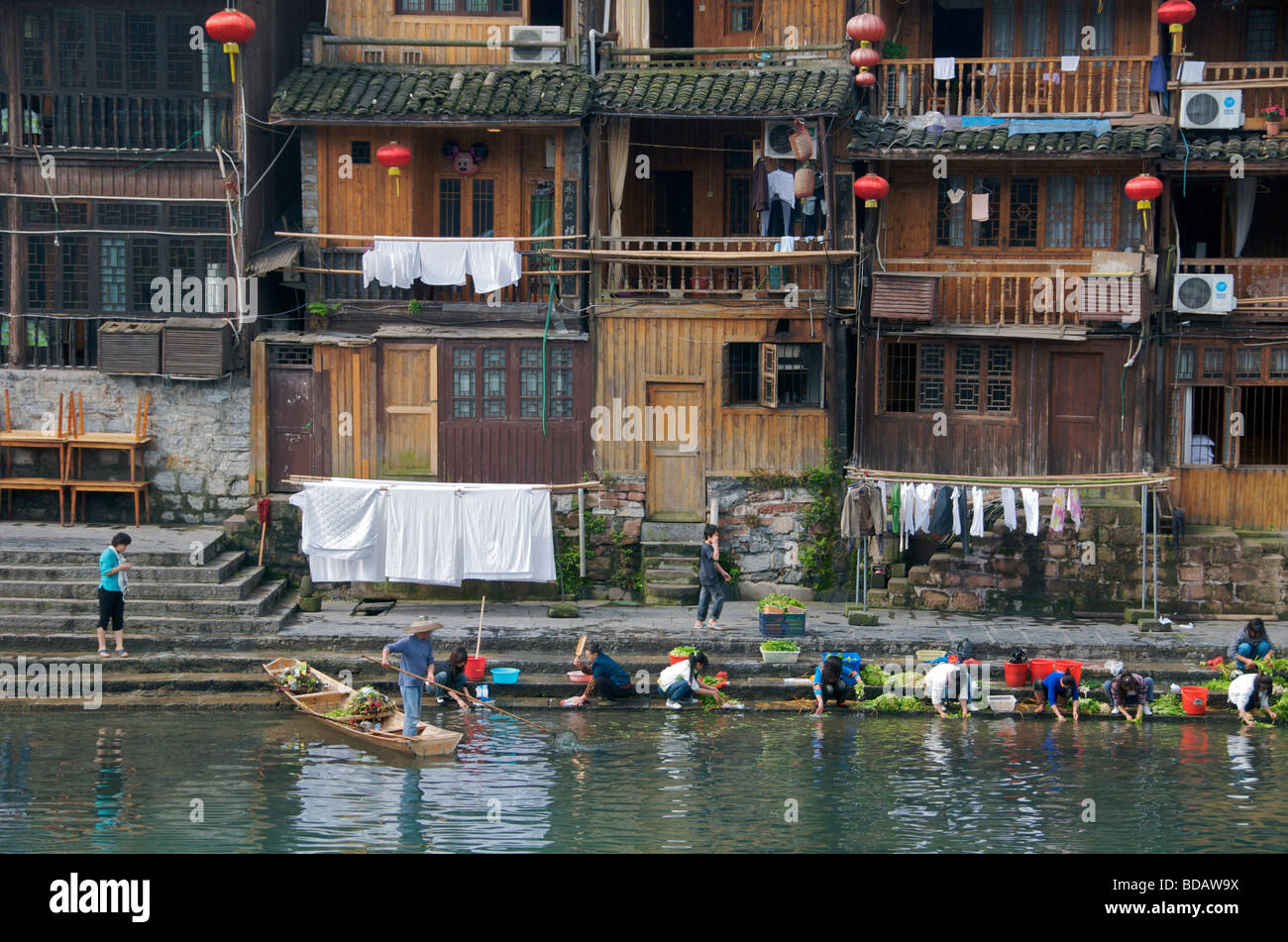 Riverfront wooden buildings on Tuo River Ancient Town of Fenghuang ...