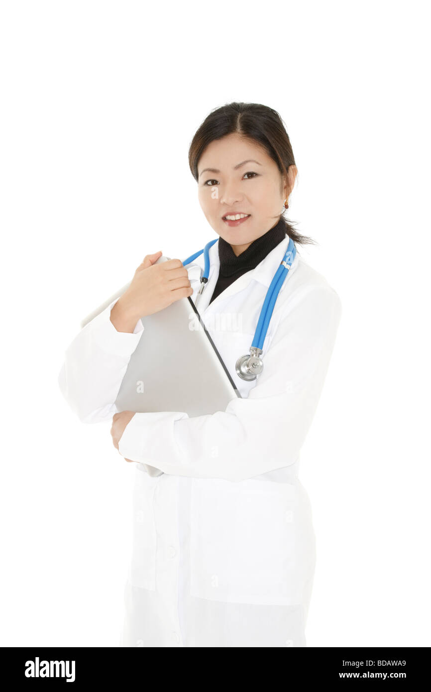 Beautiful Asian doctor or nurse on a white background Stock Photo - Alamy