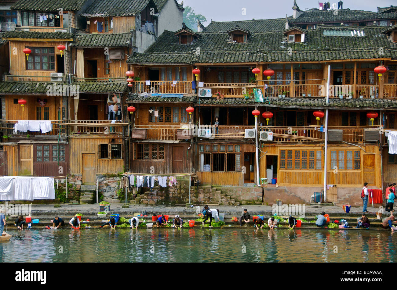 Riverfront wooden buildings on Tuo River Ancient Town of Fenghuang ...