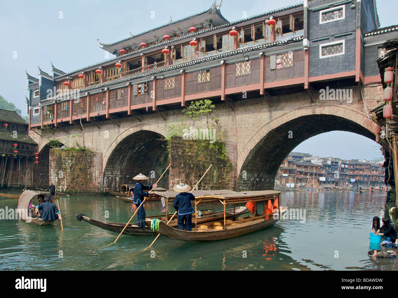 Tourist pleasure boats being rowed underneath Hong Qiao Bridge spanning ...