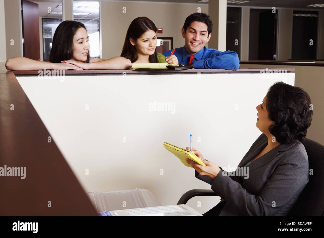 Businessman leaning over cubicle hi-res stock photography and images ...