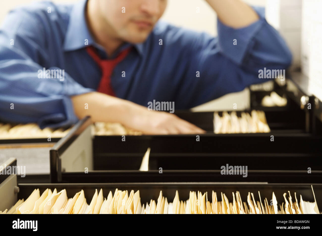 Man searching files work office hi-res stock photography and images - Alamy