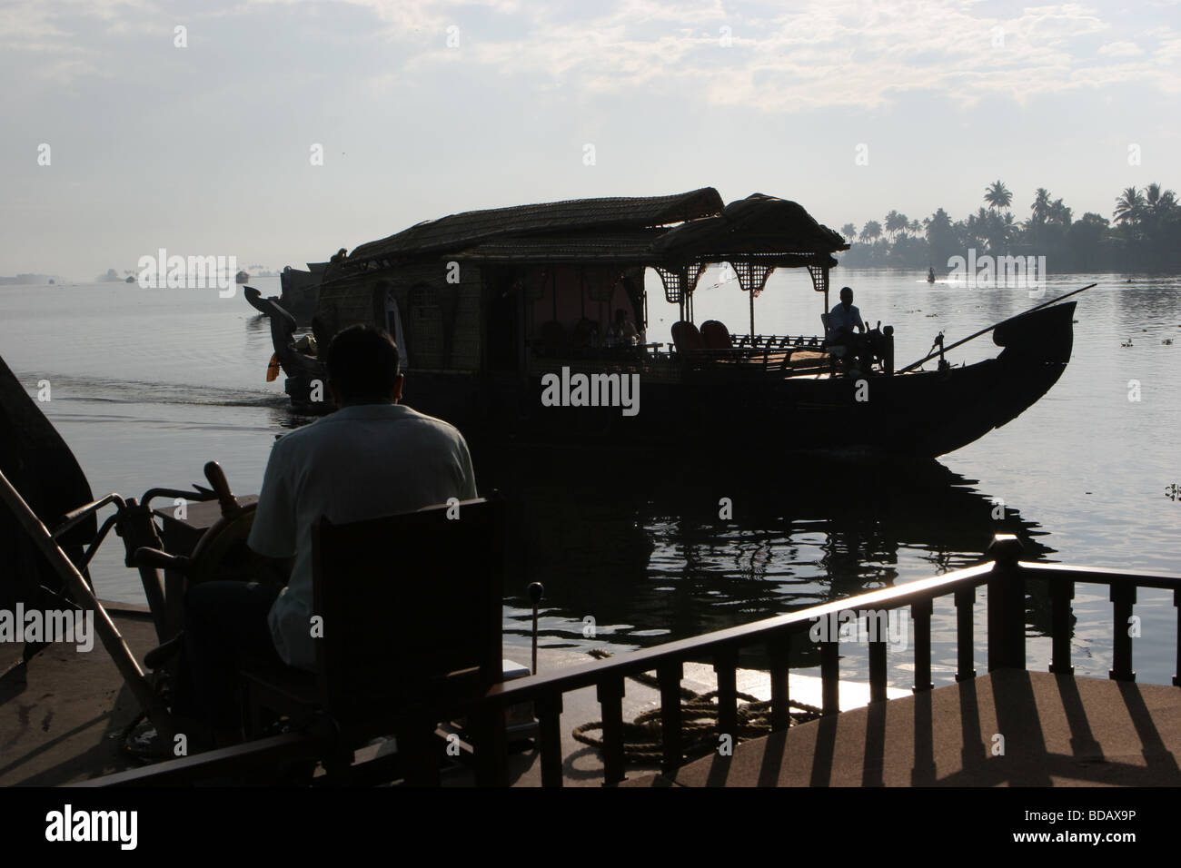 Tourist Rice boats pass on a canal in Kerala, India Stock Photo - Alamy
