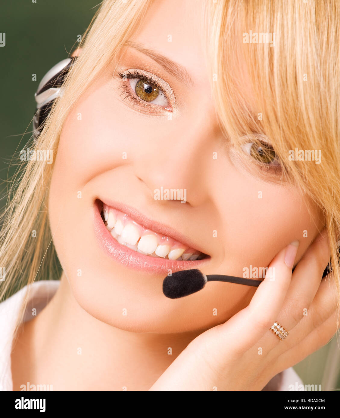 bright picture of friendly female helpline operator Stock Photo - Alamy