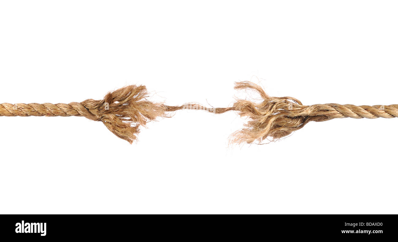 Frayed rope about to break isolated over white background Stock Photo ...