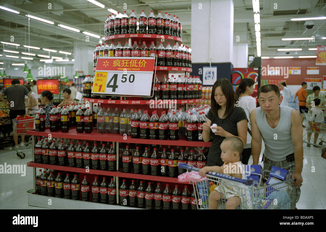 Chinese customers shopping at a Wal-Mart supermarket in Beijing, China ...