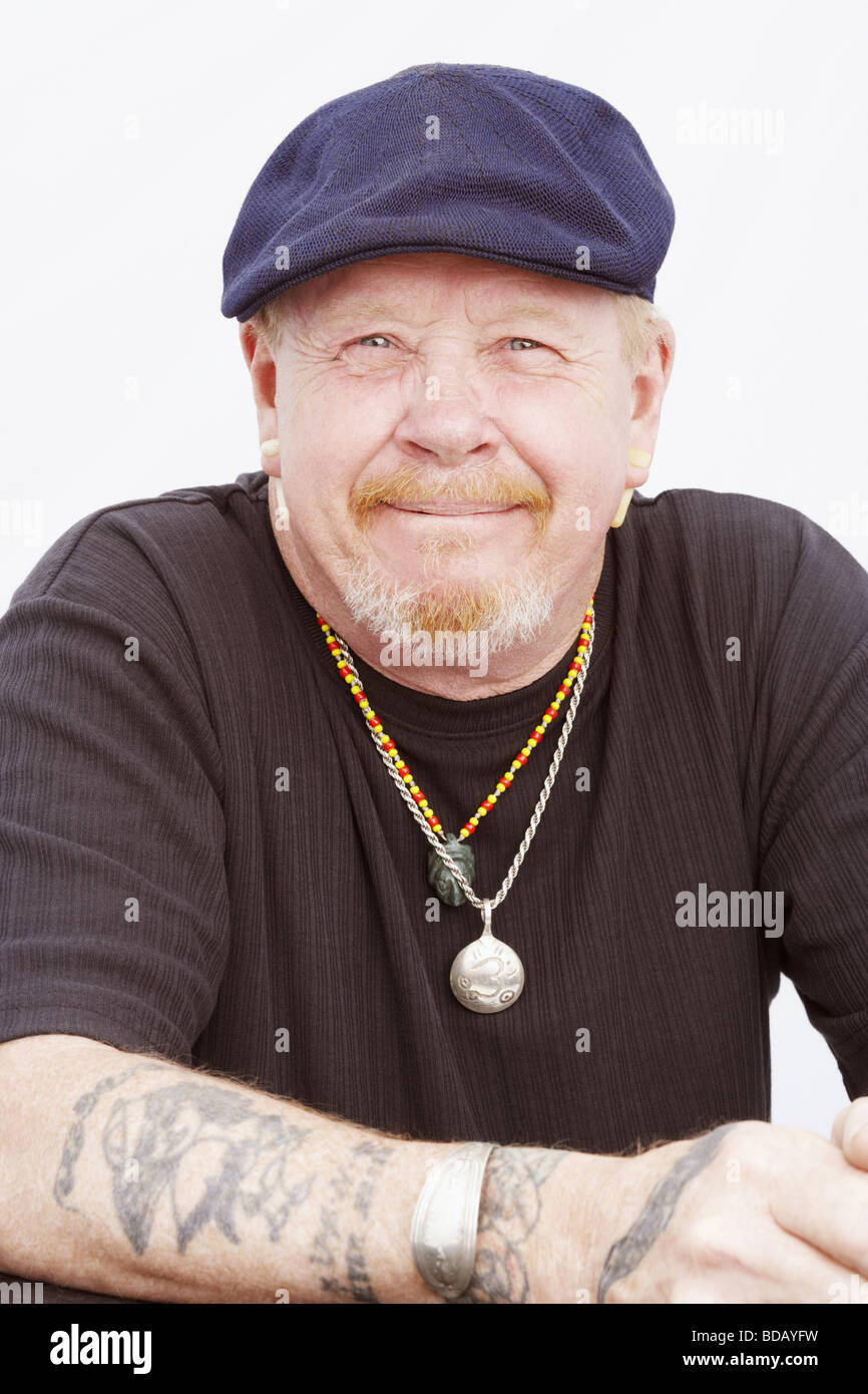 Portrait of a senior man making a face Stock Photo - Alamy
