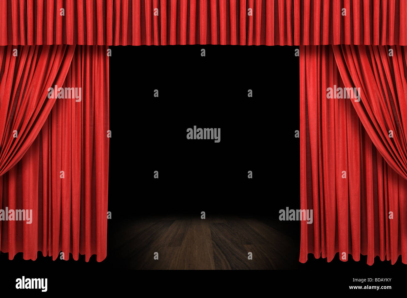 Large red curtain stage opening with dark background Stock Photo - Alamy