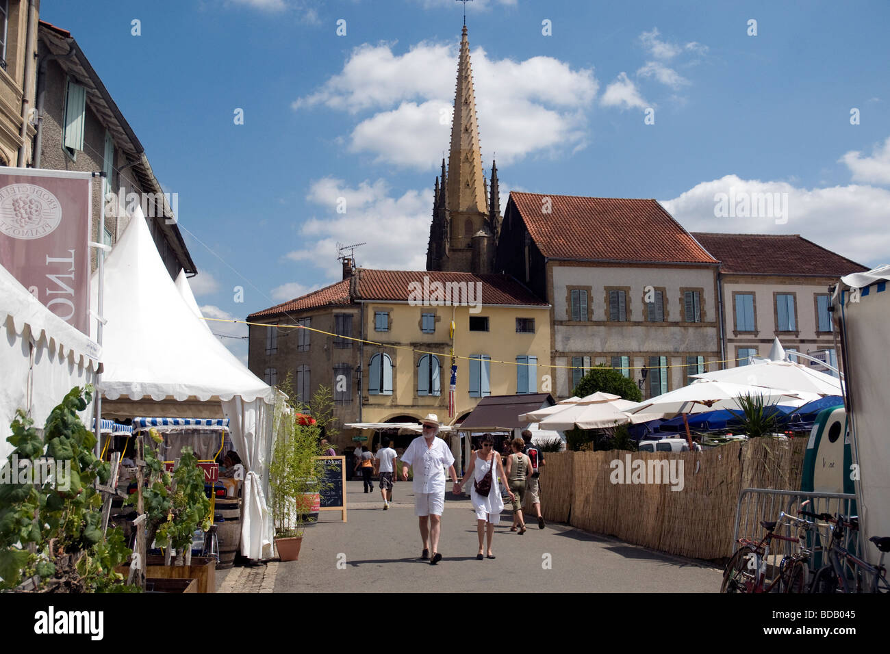 Visitors stroll the main square during the annual Marciac jazz festival ...