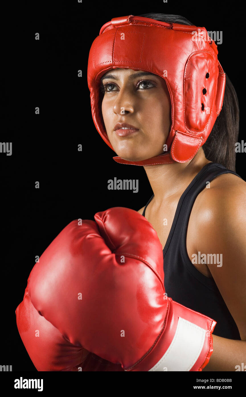 Woman boxing head protector hi-res stock photography and images - Alamy