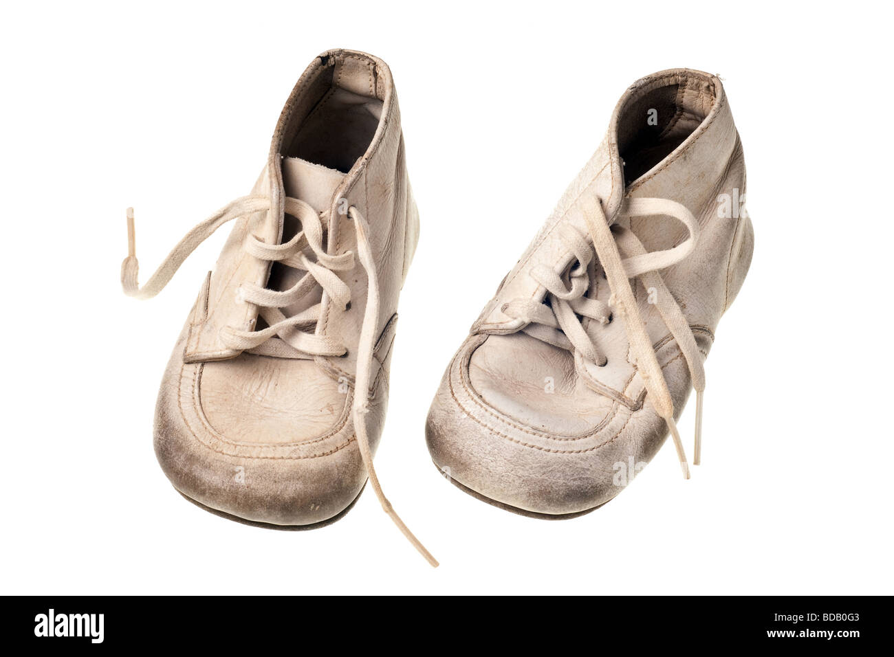 old baby shoes isolated on white background Stock Photo - Alamy