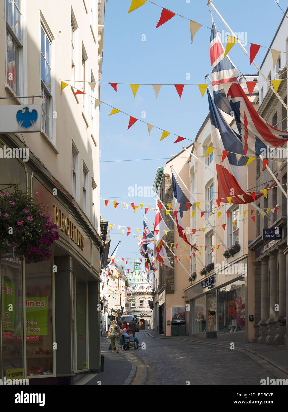 Tourists walk in the pedestrianised High Street near the Church in St ...
