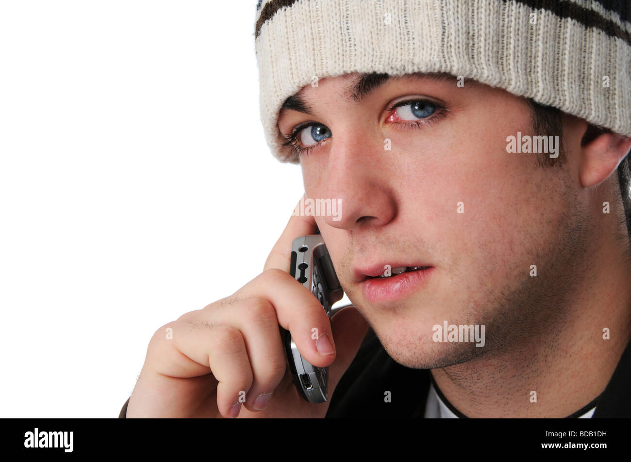 Teen boy on the cell phone isolated on a white background Stock Photo ...