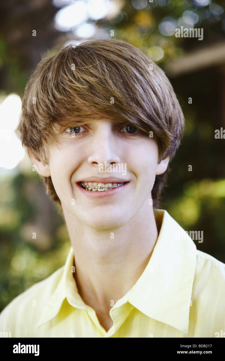 Portrait of a young man smiling Stock Photo - Alamy