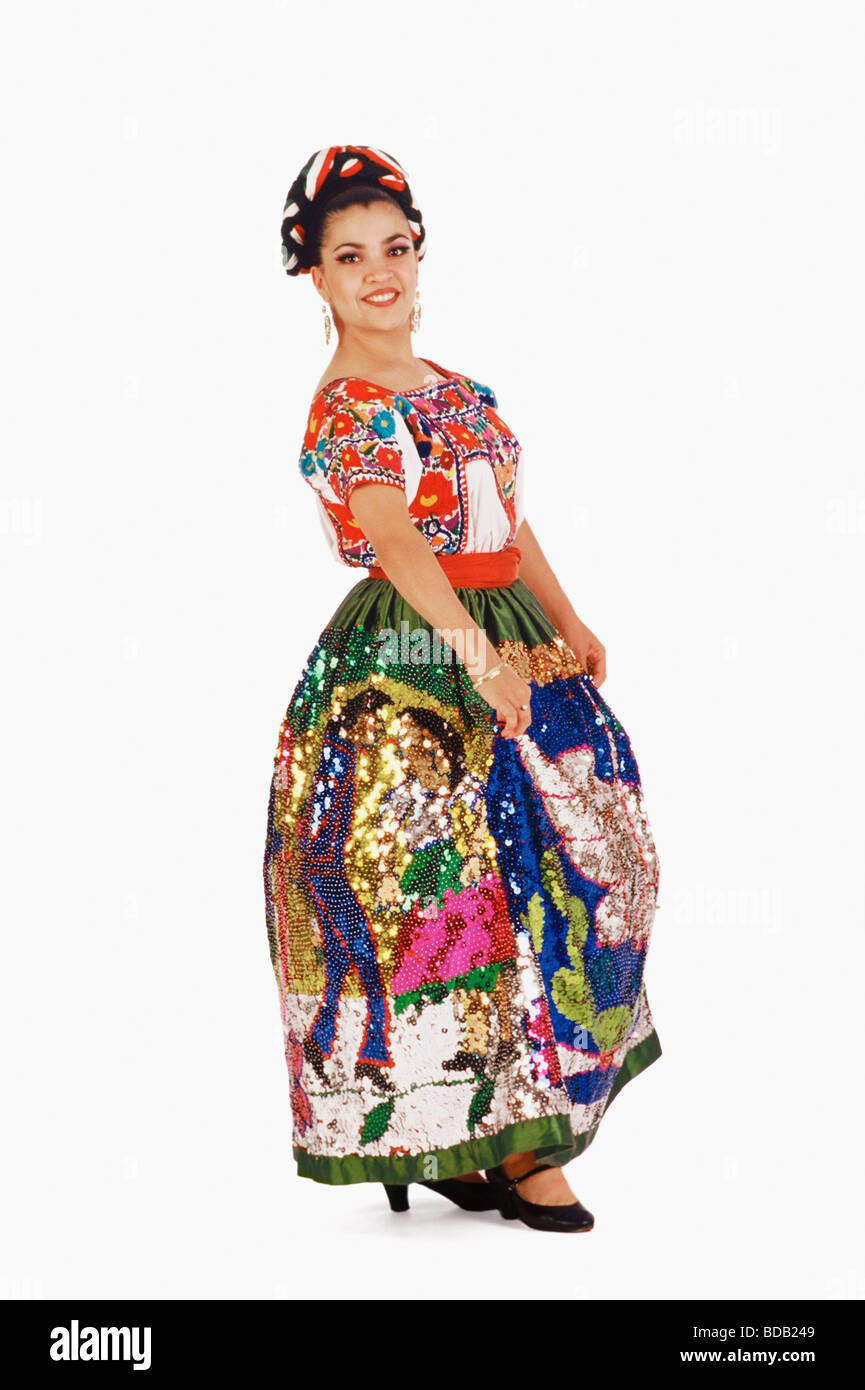 Portrait of a mid adult woman performing folk dance Stock Photo - Alamy