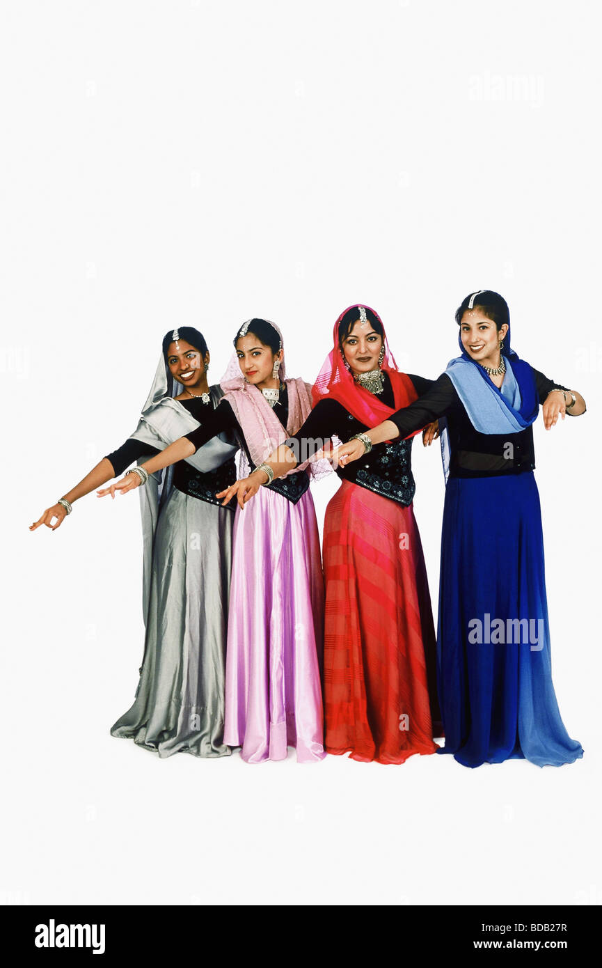 Four young women dancing together Stock Photo - Alamy