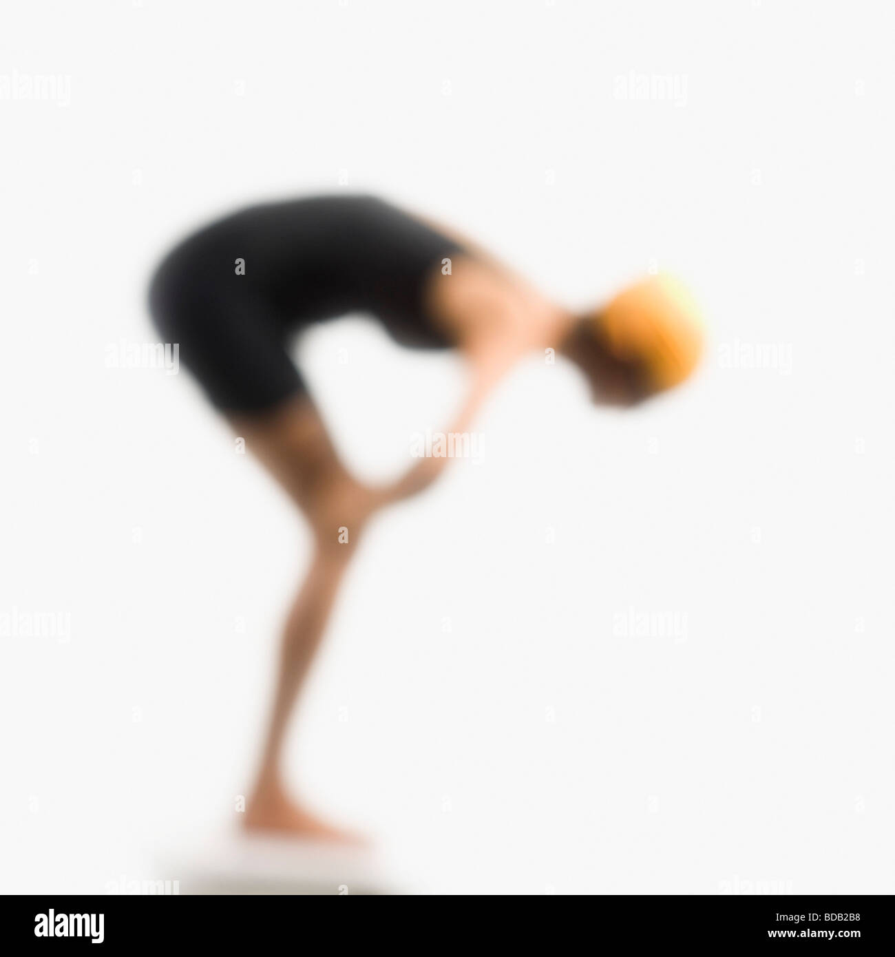 Side profile of a young woman diving from a diving board Stock Photo ...