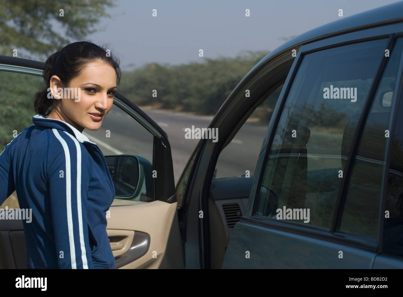 Woman entering a car hi-res stock photography and images - Alamy
