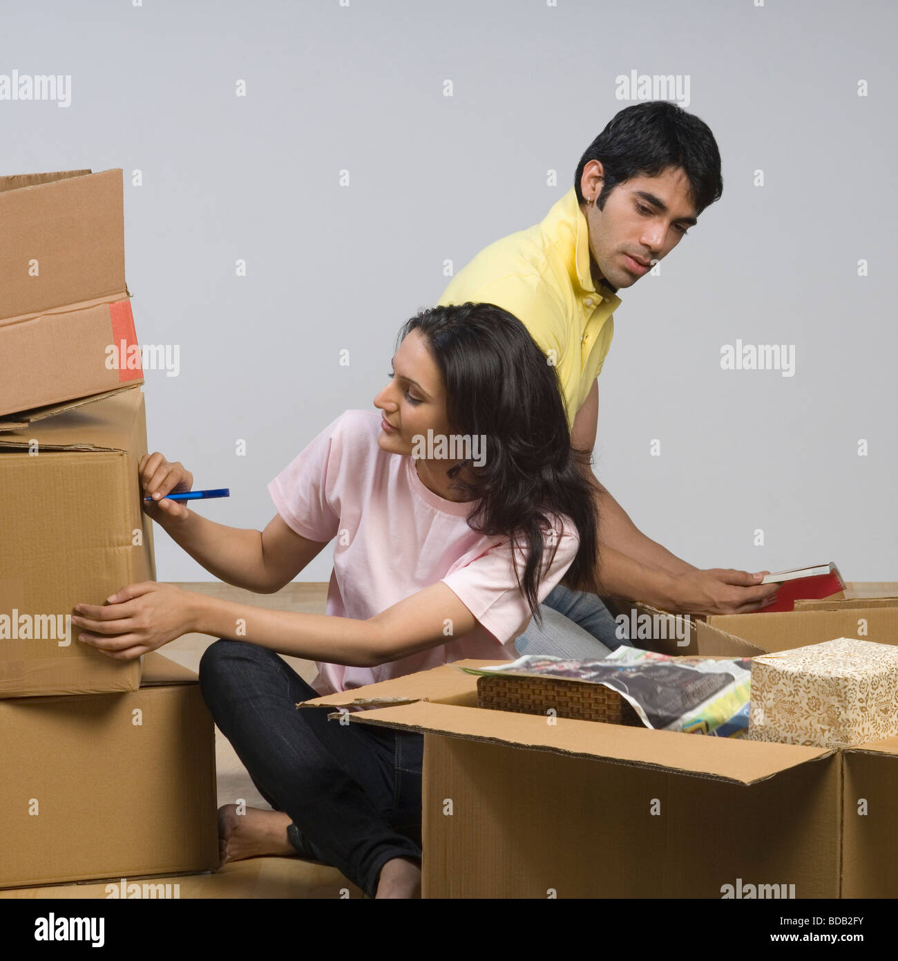 Indian couple cardboard box hi-res stock photography and images - Alamy