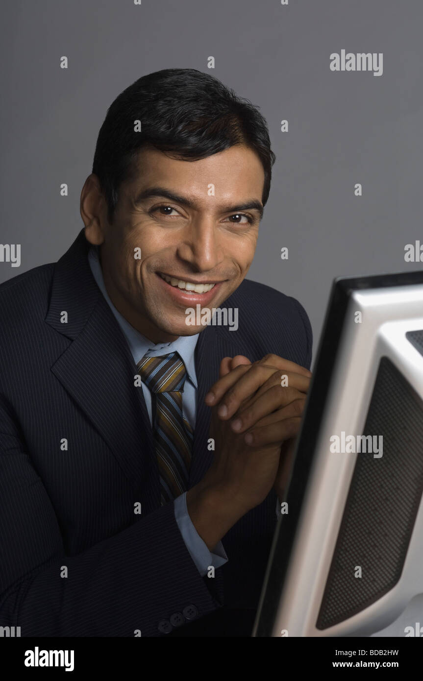 Businessman in front desktop hi-res stock photography and images - Alamy