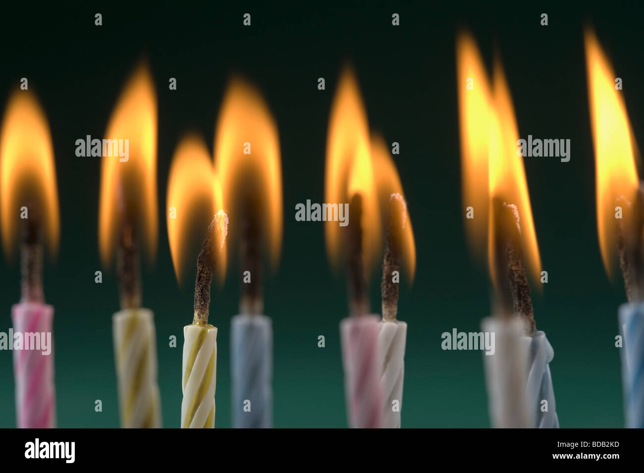 Close-up of burning birthday candles Stock Photo - Alamy