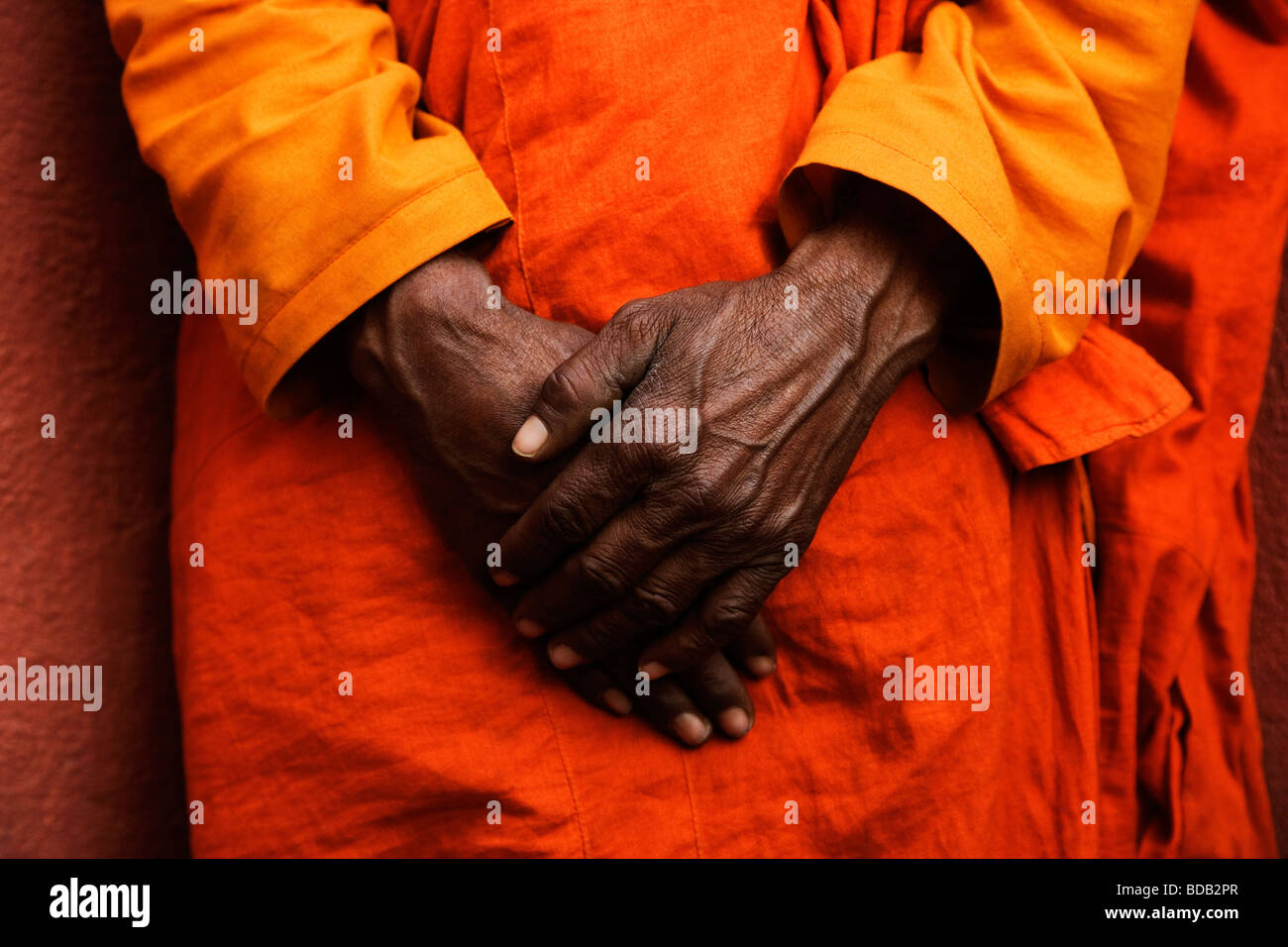 Buddhist monk clasped hands hi-res stock photography and images - Alamy