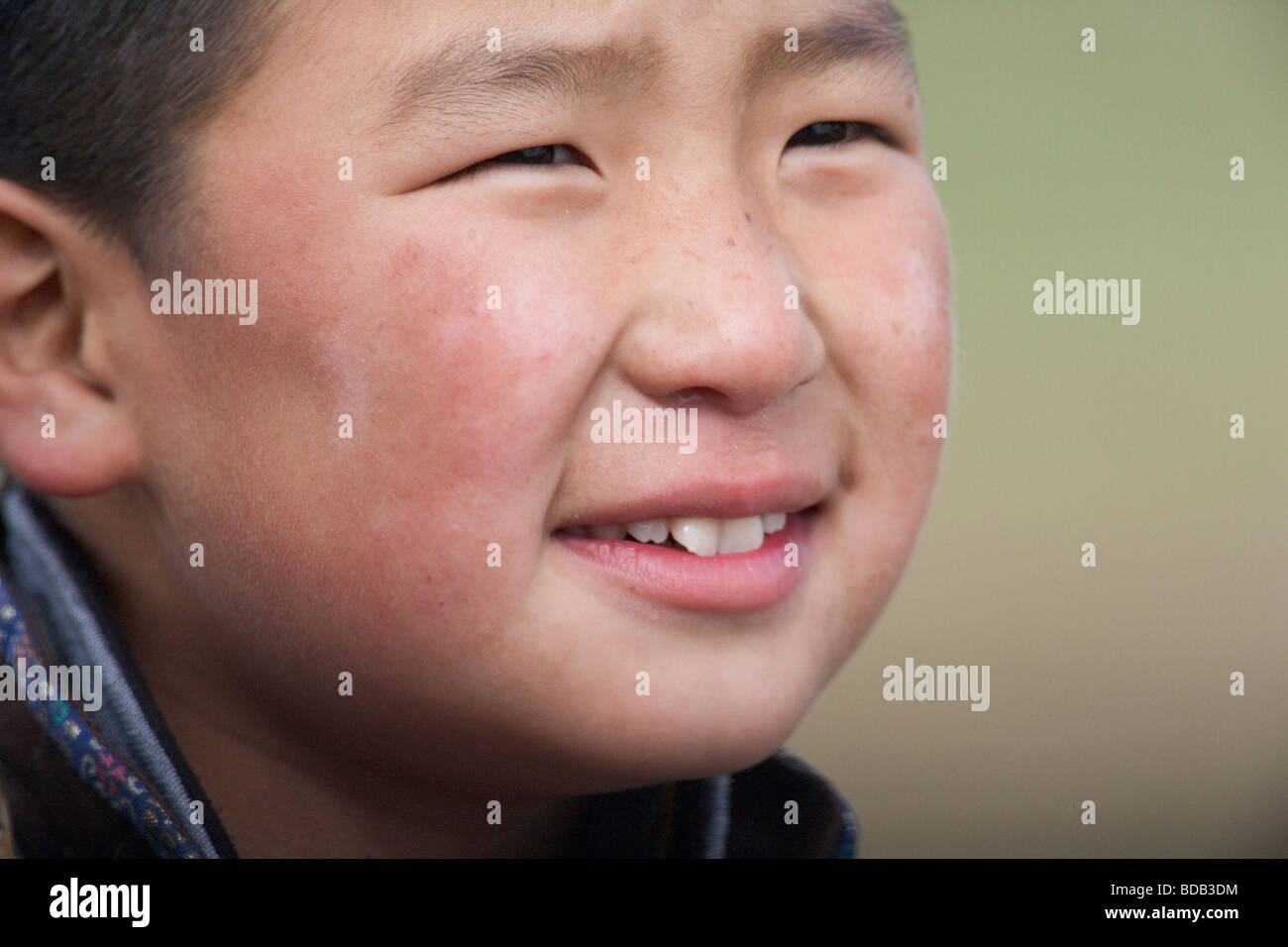 Mongolian herder boy, north central Mongolia. Face only Stock Photo - Alamy