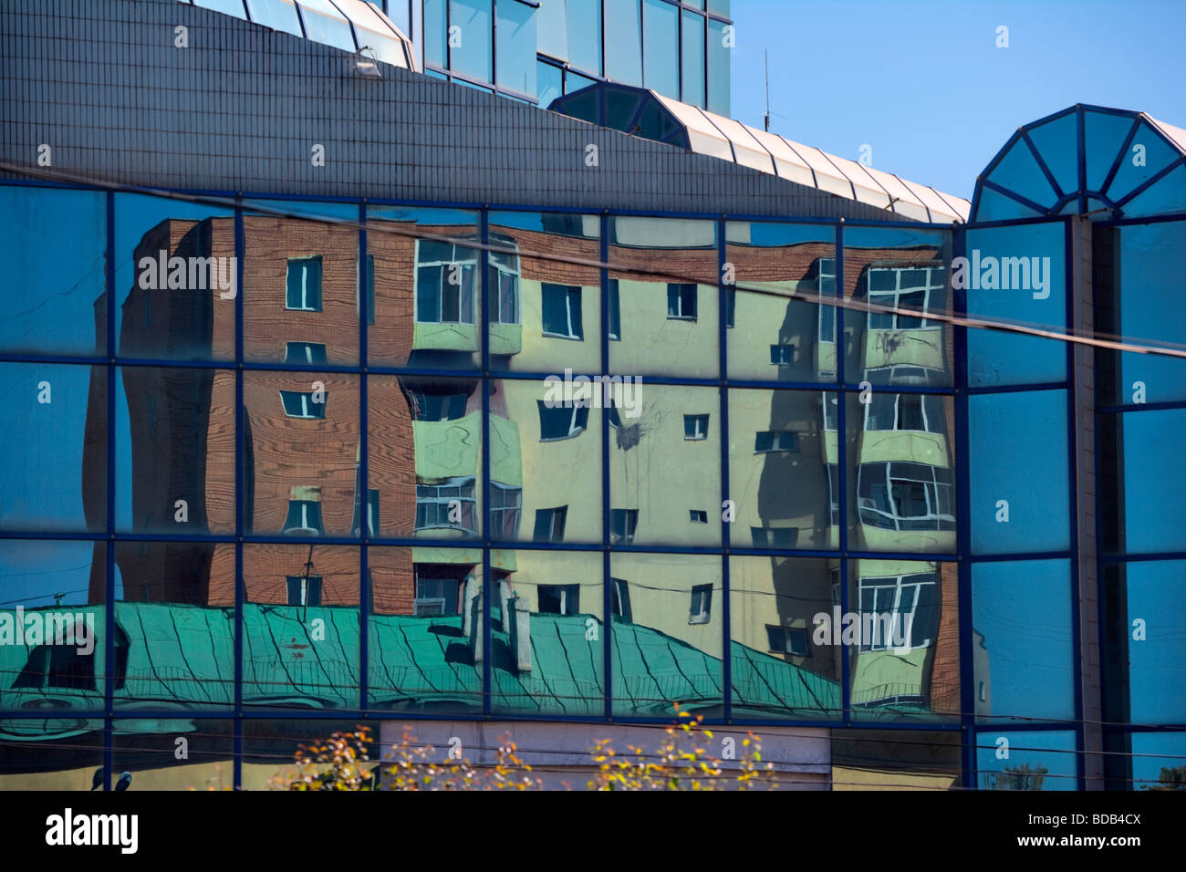 Reflections in modern glass building windows, Ulaan Baatar, Mongolia ...