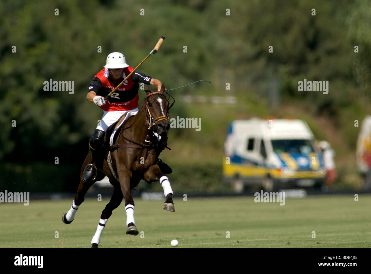 Polo players galloping after ball during match at Santa Maria Polo Club ...