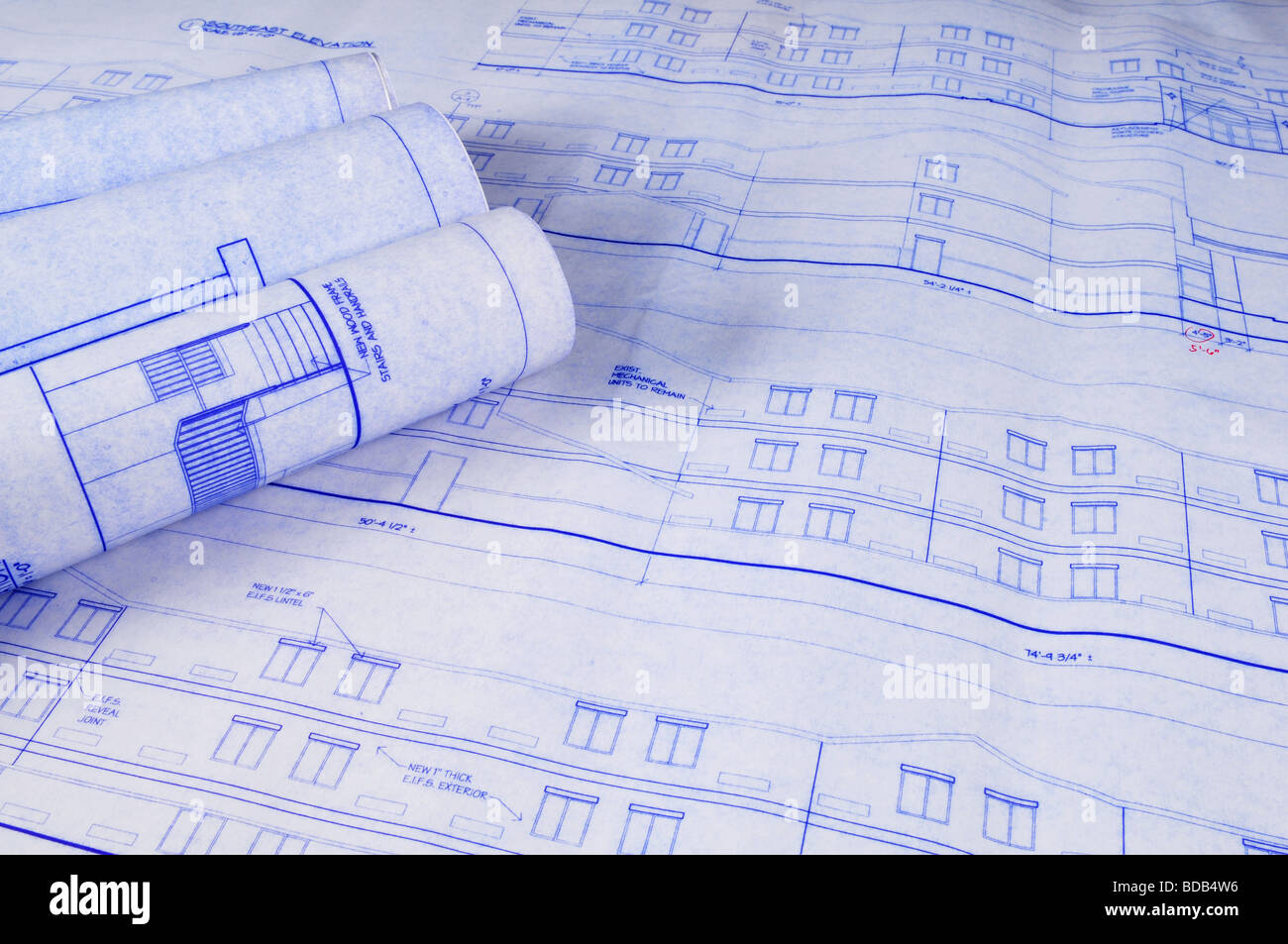 Architectural blueprints on a table Stock Photo - Alamy