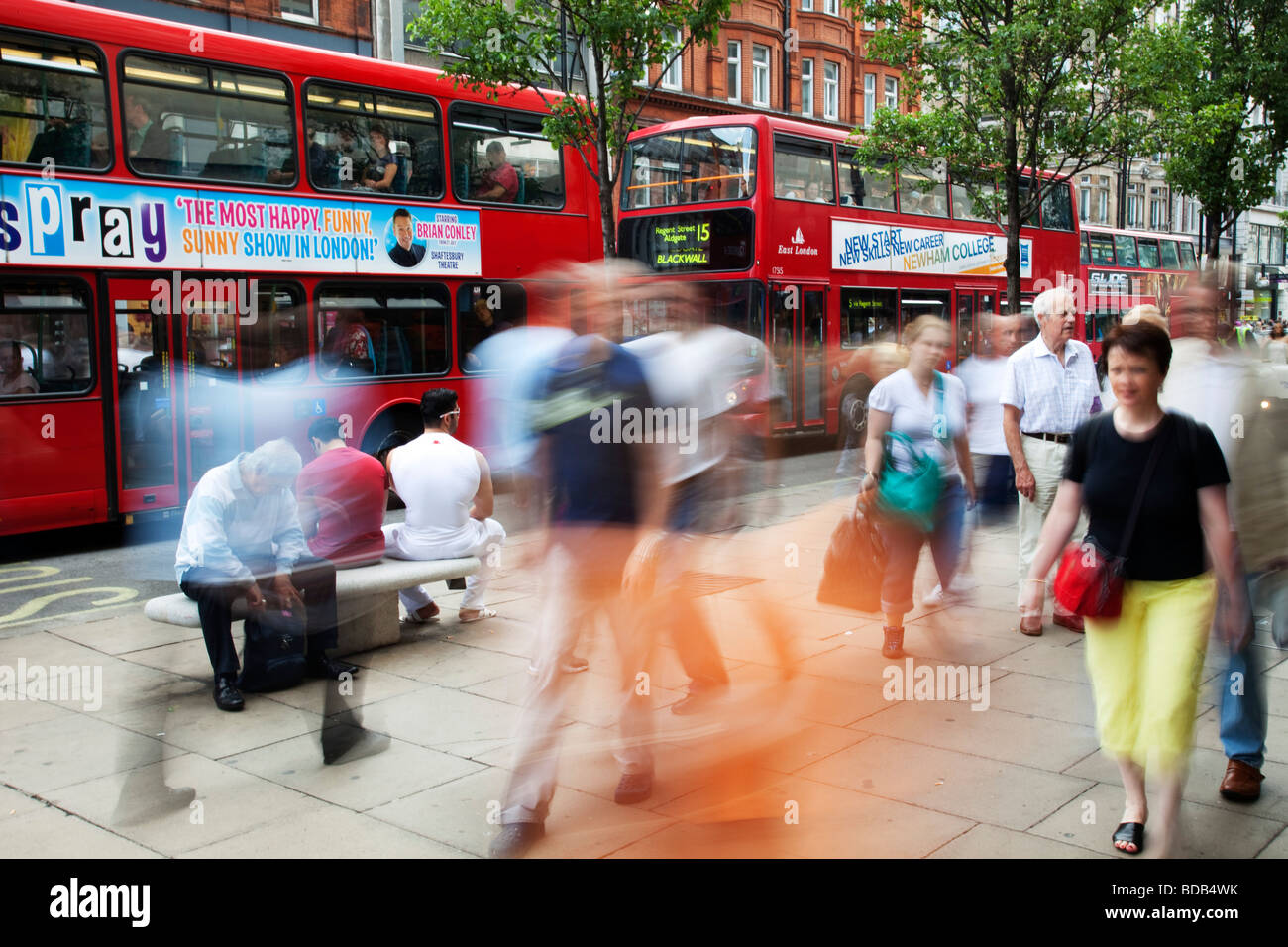 Shoppers on Oxford Street in Central London. This is a busy shopping ...