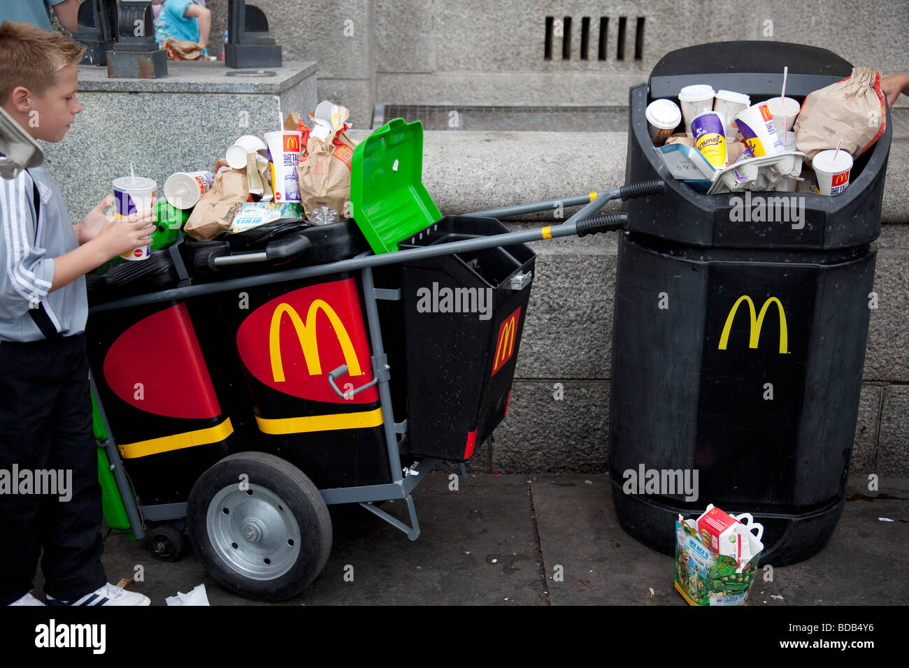 Overflowing bins full of rubbish from a nearby McDonalds fast food ...