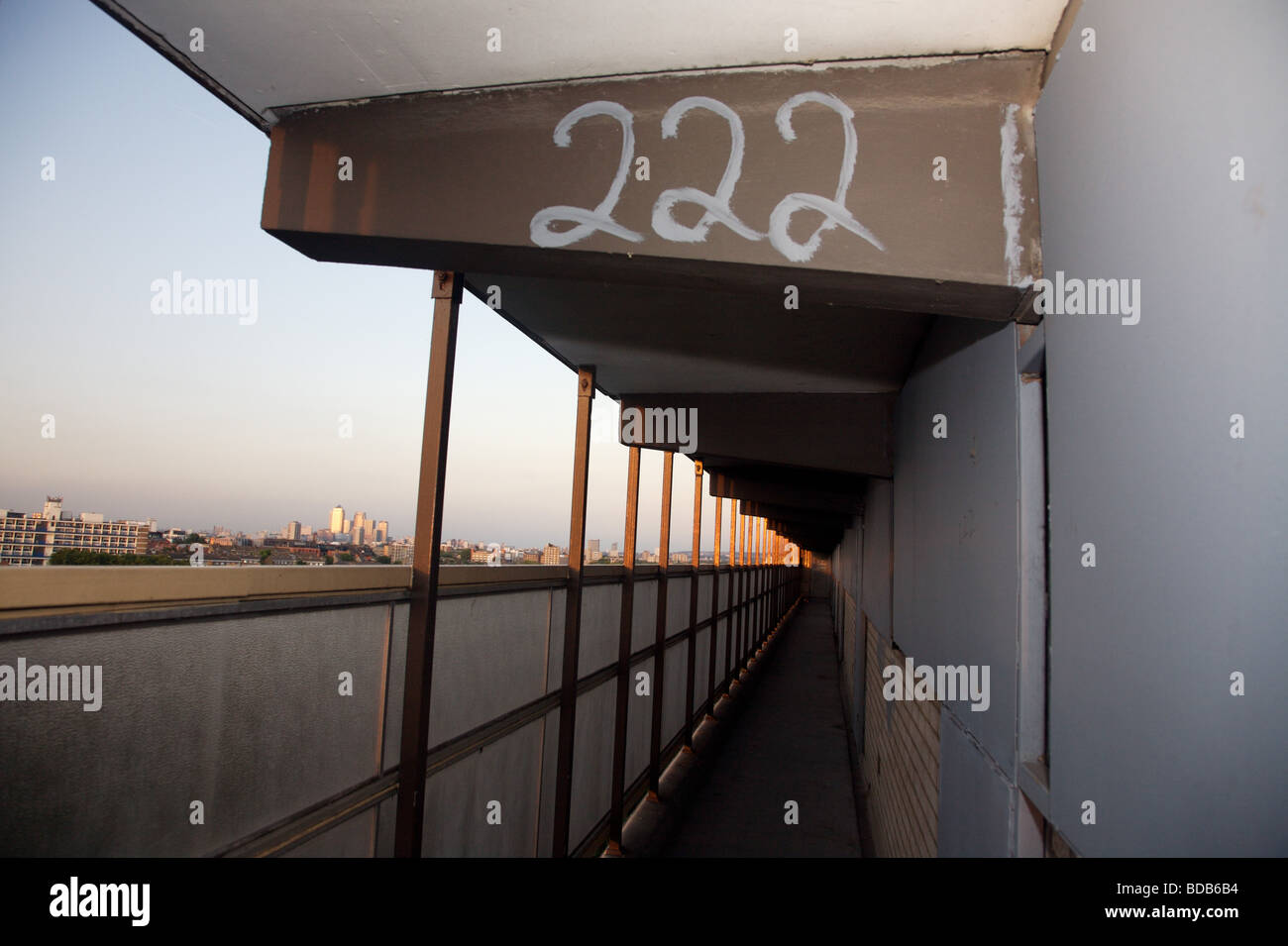 perspective view down corridor of derelict council block in elephant ...