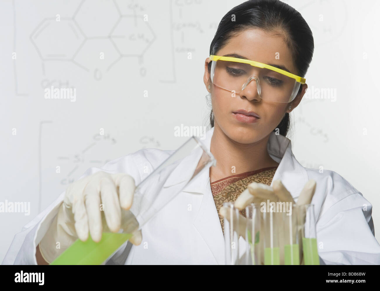 Scientist experimenting in a laboratory Stock Photo - Alamy Scientist experimenting in a laboratory Stock Photo - Alamy