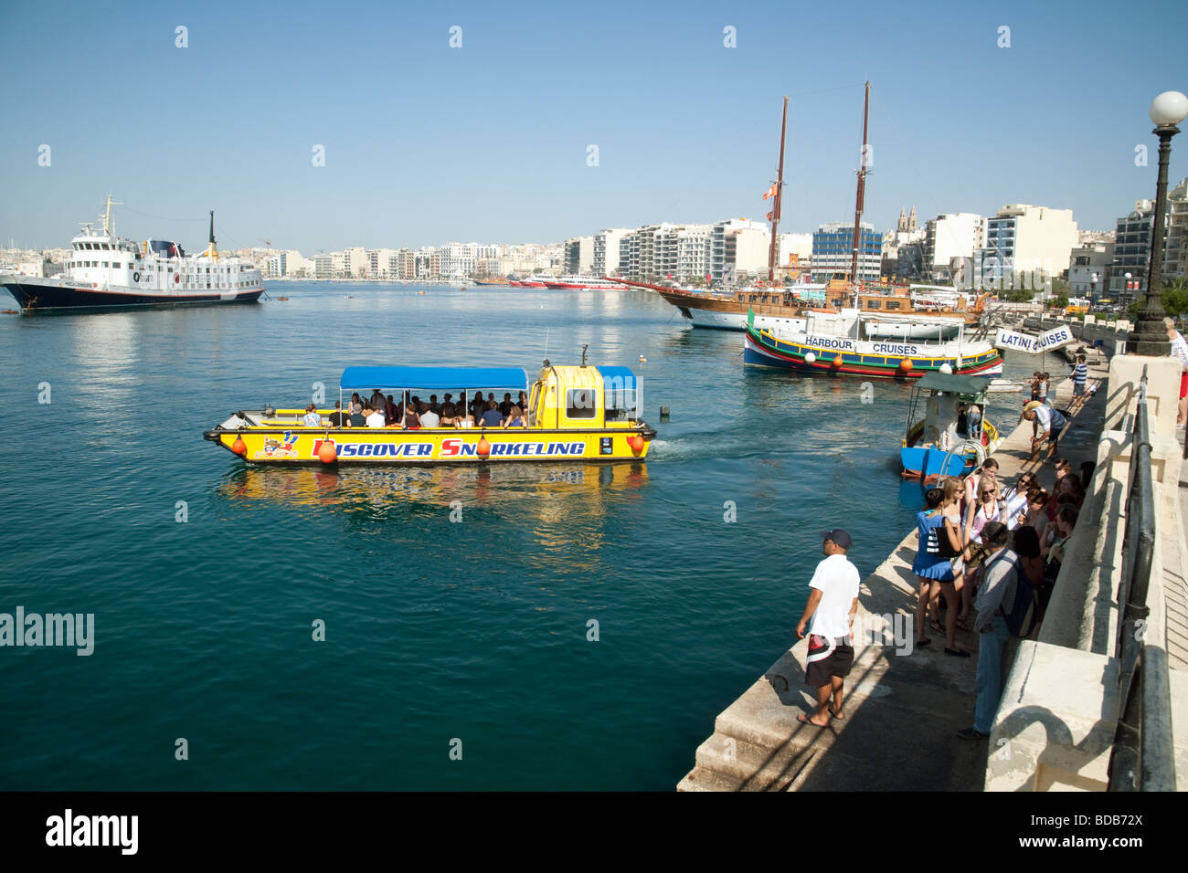 Scene on the busy waterfront at Sliema, Malta Stock Photo - Alamy