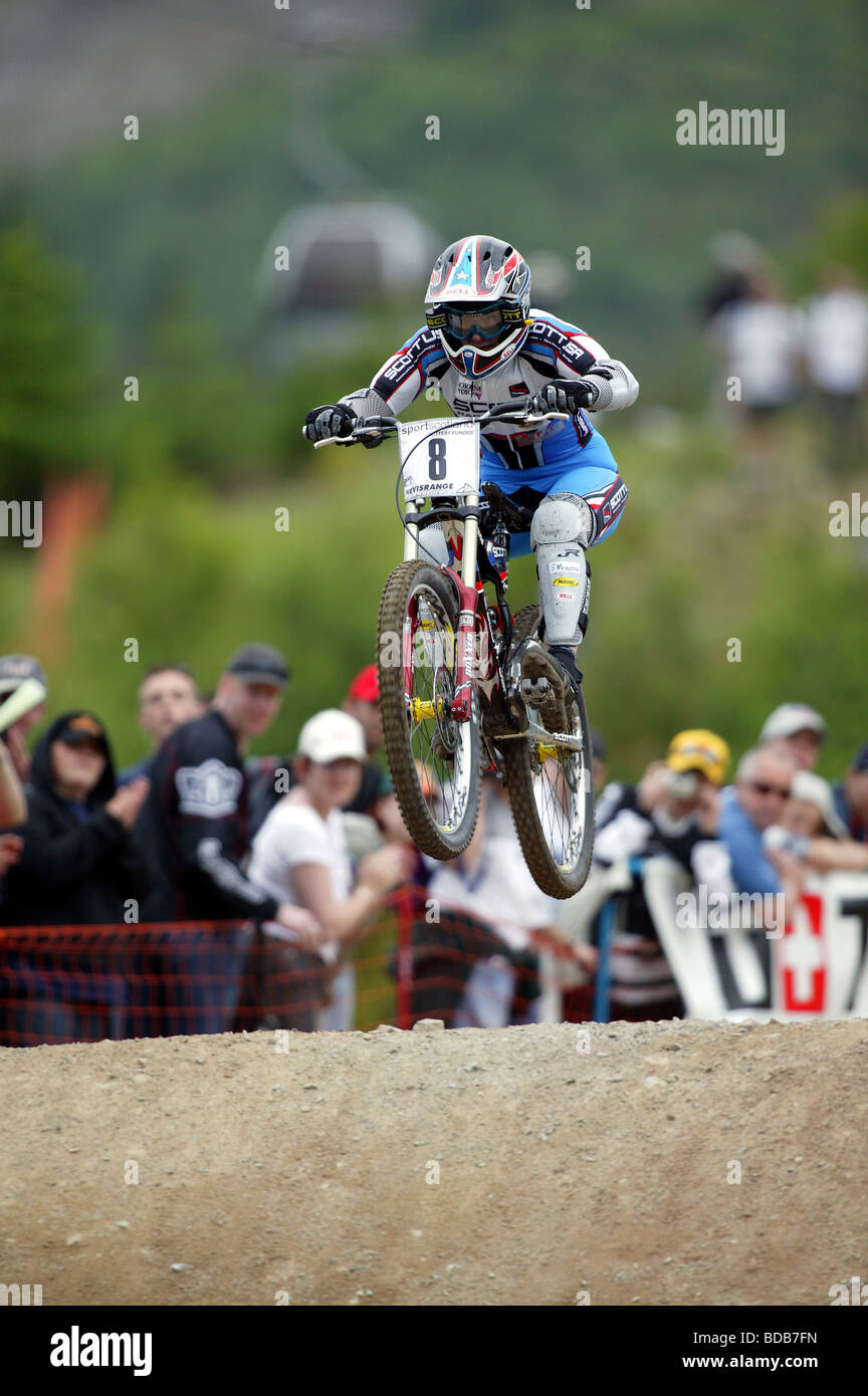 A Female Downhill Mountain Bike Racer in action Stock Photo - Alamy