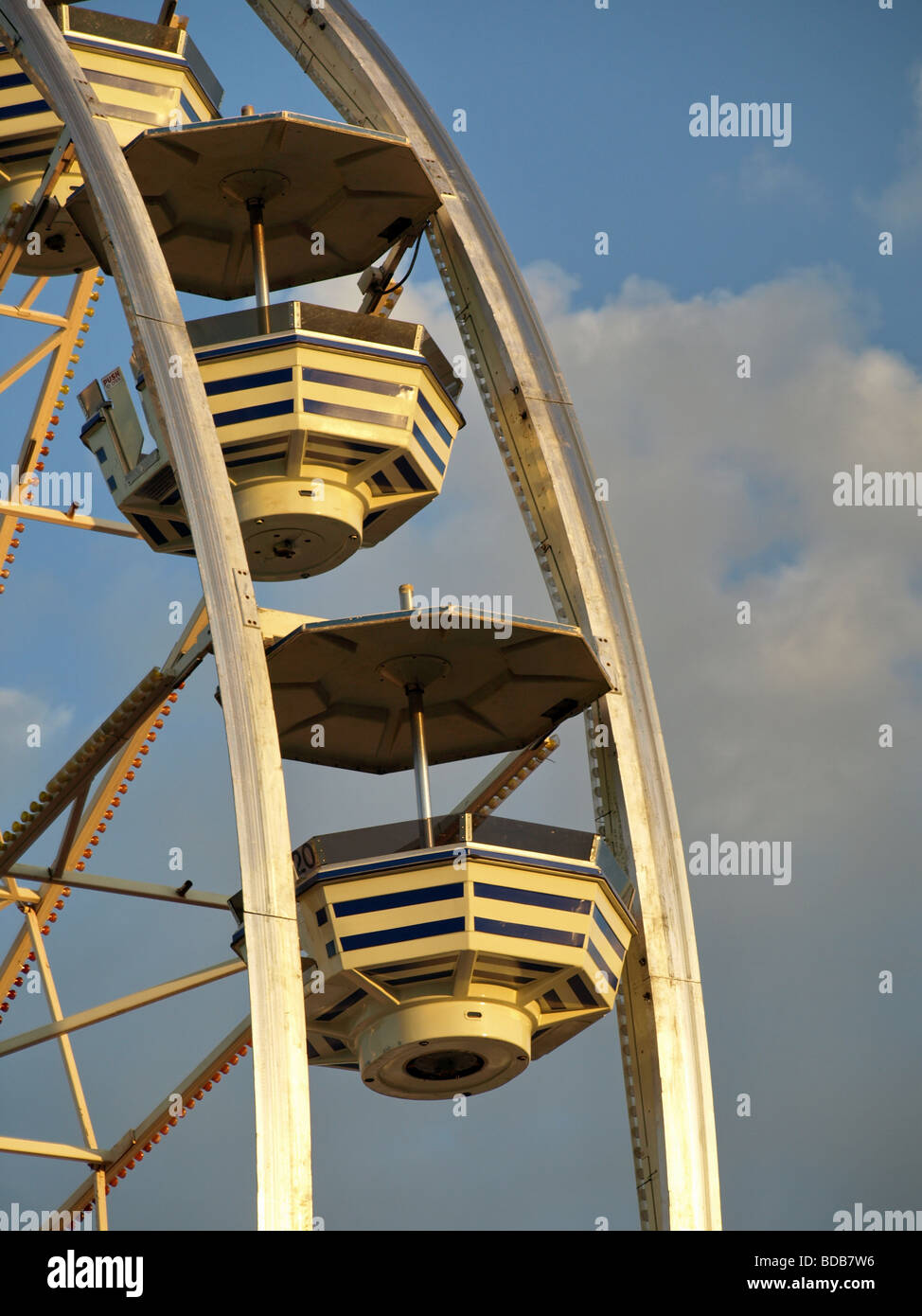 Ferris wheel close up against a blue sky with pretty clouds Stock Photo ...