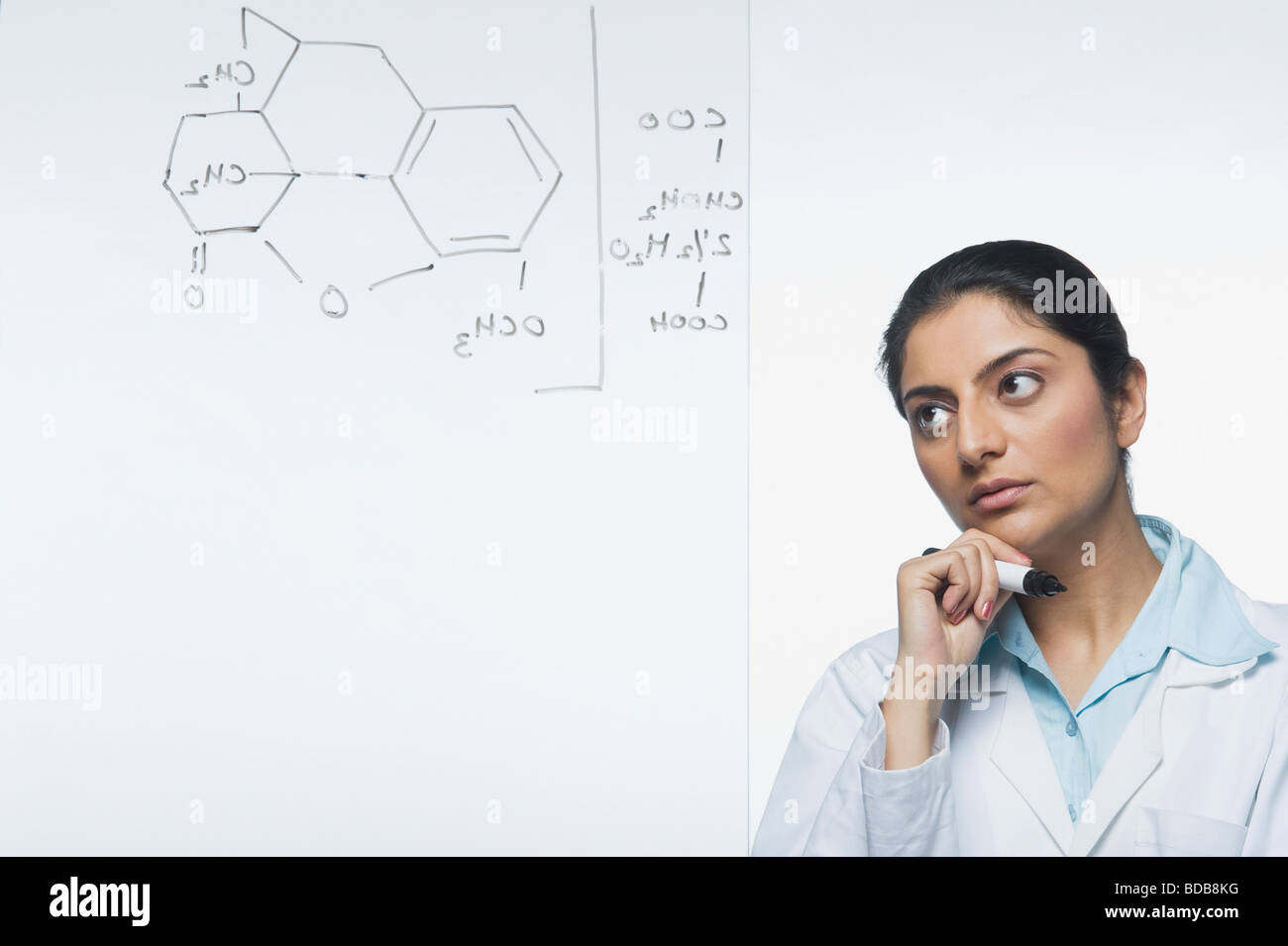 Scientist thinking in a lab Stock Photo - Alamy