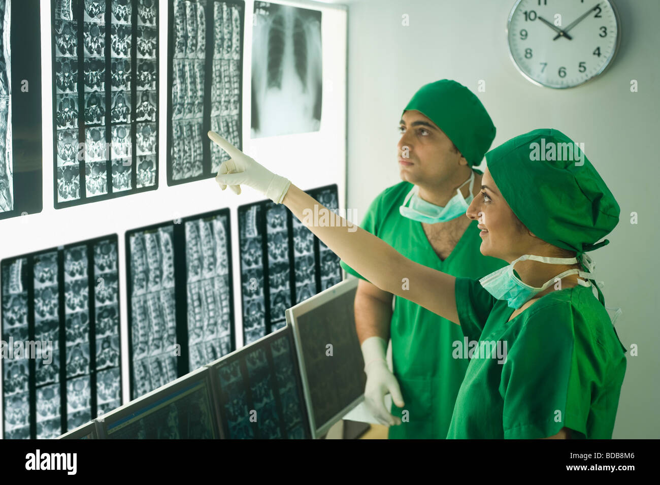 Surgeon checking monitor hi-res stock photography and images - Alamy