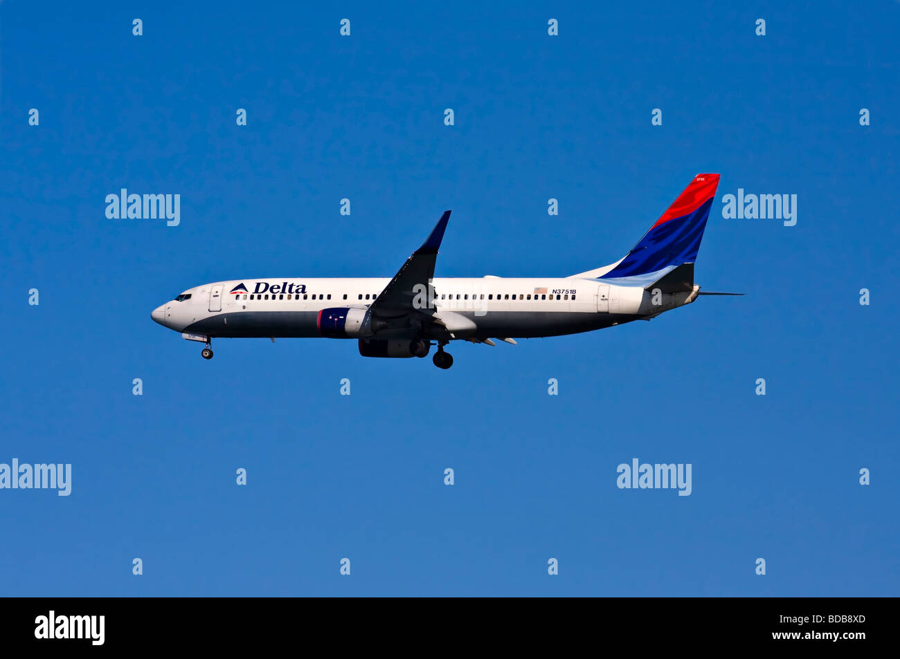 Delta Air Lines Boeing 737-832 in flight with landing gear down Stock ...